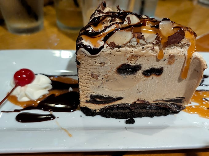 This isn't just chocolate cake—it's a layer-by-layer autobiography of cocoa's greatest achievements, topped with a caramel plot twist.