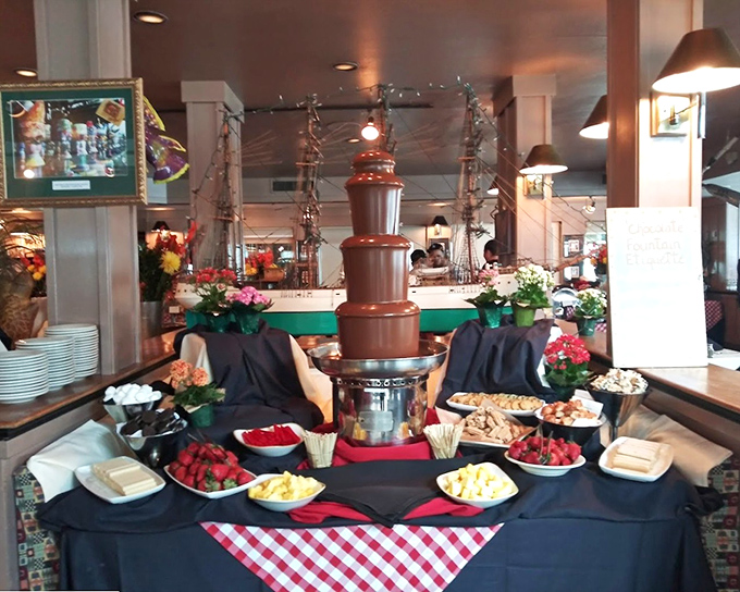 Not all waterfalls are outdoors—this chocolate cascade surrounded by fresh fruit is Mother Nature's way of saying "I'm sorry about the rain."