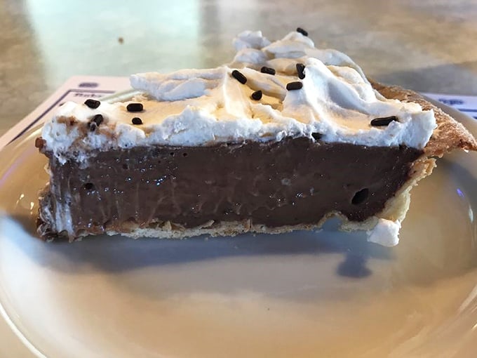 This chocolate cream pie doesn't need filters or fancy lighting—it's the dessert equivalent of that friend who's naturally photogenic.