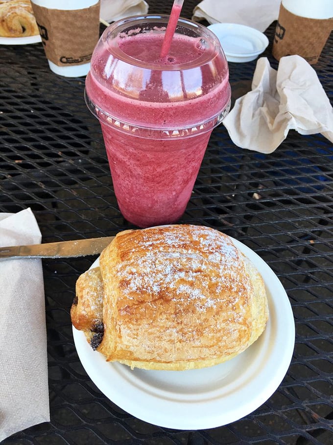 A berry smoothie and pastry pairing that makes you feel virtuous and indulgent simultaneously—the culinary equivalent of reading classic literature while in a bubble bath.