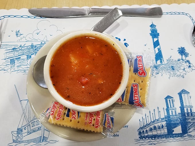 Minorcan clam chowder that tells the story of St. Augustine in every spoonful—a tomato-based rebellion against New England's creamy monopoly.