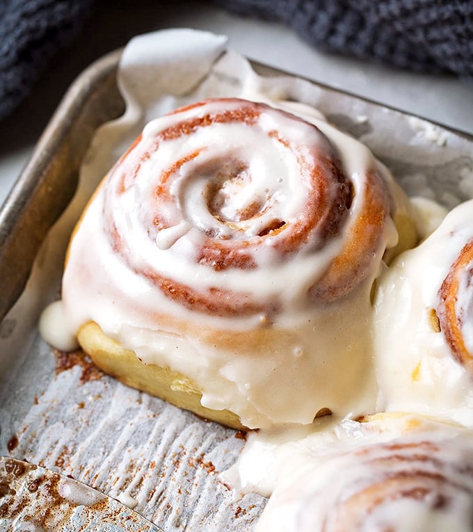 The humble cinnamon roll – proof that spirals aren't just for galaxies, and that frosting is nature's way of saying "Good morning, champion."