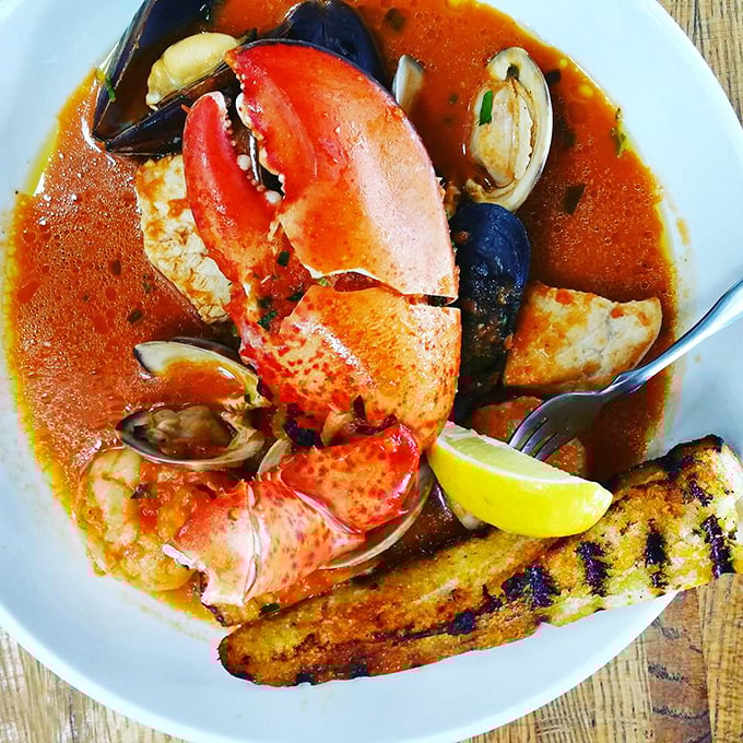Cioppino that could make a mermaid weep – a tomato-based symphony of shellfish and tender fish chunks.