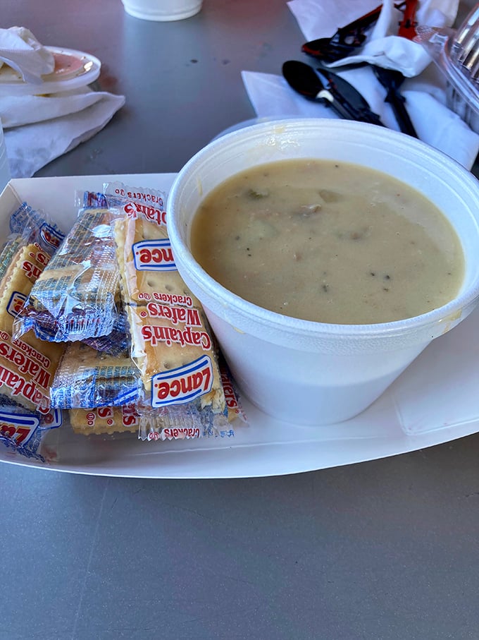 A cup of clam chowder that could make a New Englander question their loyalty. Creamy, hearty, and begging to be sopped up with those crackers.