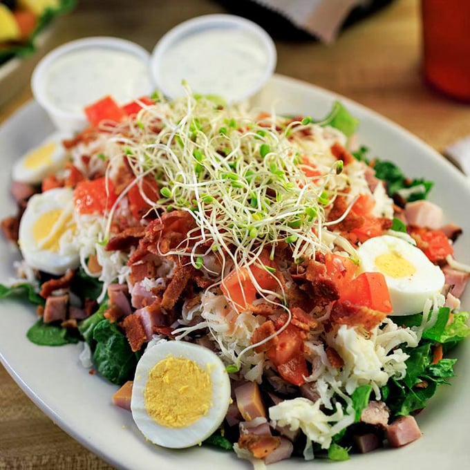 This Cobb salad isn't just lunch – it's an architectural masterpiece of protein, veggies, and egg that makes "eating your greens" a pleasure.