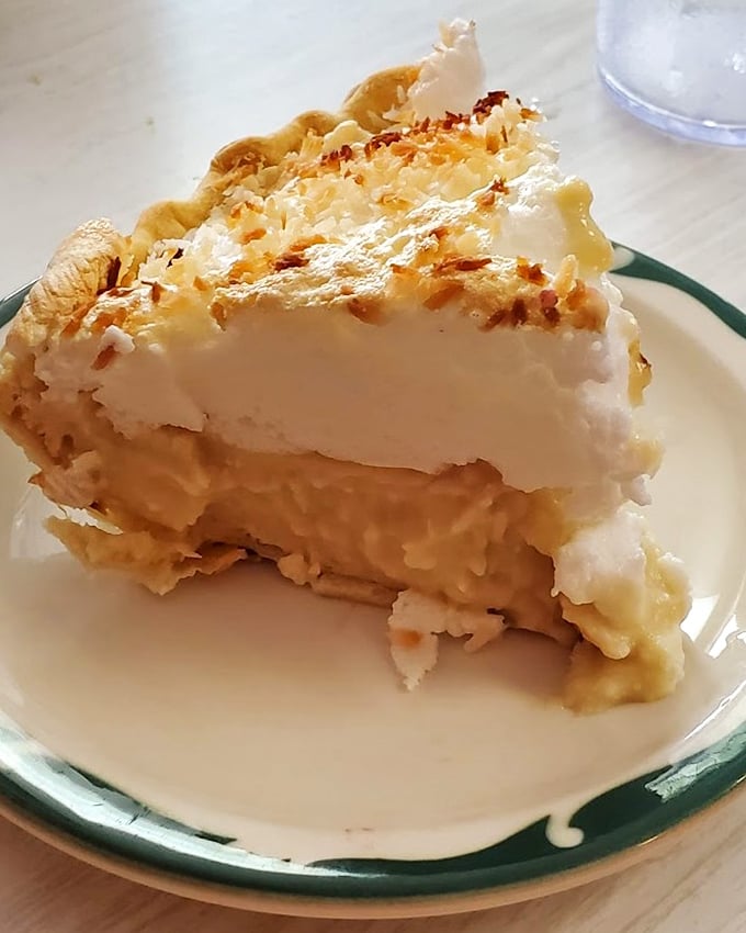 This coconut cream pie doesn't just have layers of filling and topping—it has layers of nostalgia that hit you harder than your first crush.