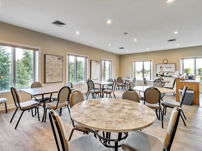 Where neighbors become friends over coffee and conversation. Tables positioned perfectly for both privacy and the possibility of community.