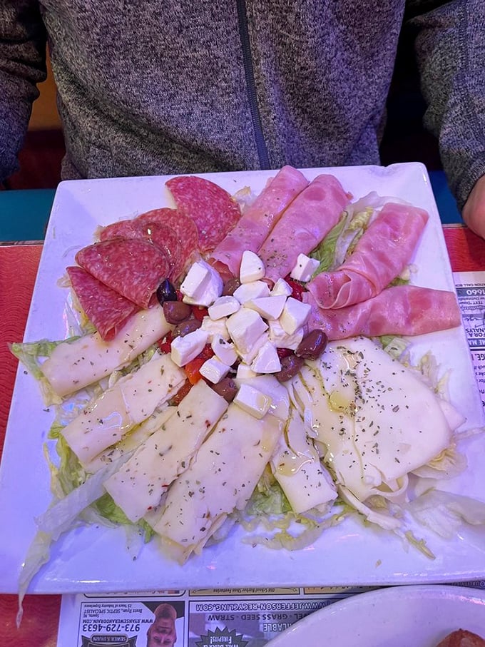 The antipasto salad—where Italy meets Jersey in a delicious summit of cured meats, cheeses, and vegetables that would make both countries proud.