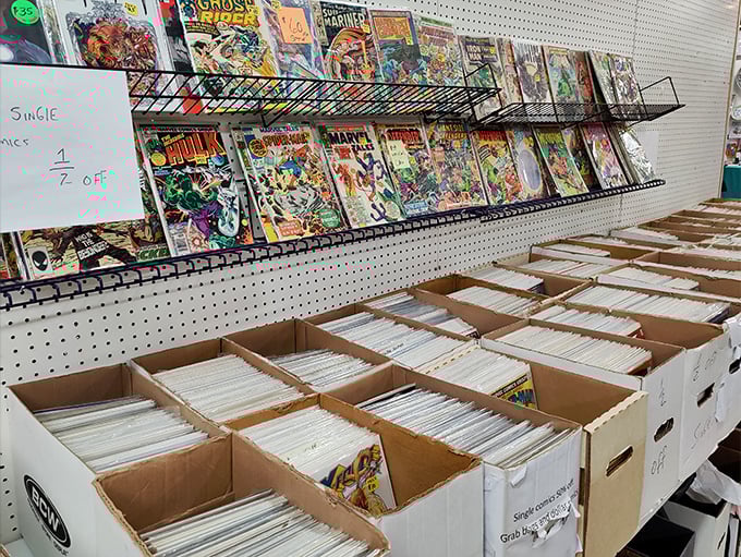 Comic book heaven where superhero adventures await, perfectly preserved behind plastic sleeves—childhood nostalgia with adult investment potential.