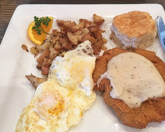 Country fried steak with gravy, eggs, and home fries—the breakfast equivalent of winning the lottery before your first cup of coffee.