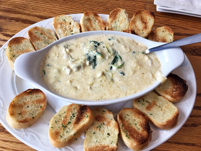 This crab and spinach dip surrounded by toasted bread is the diplomatic solution when you can't decide between appetizer and entrée.