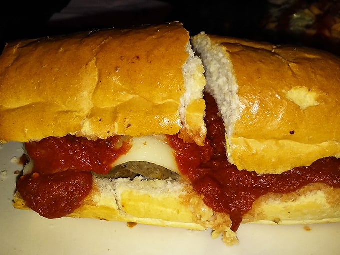 The meatball sandwich that's worth driving across state lines for—saucy, cheesy, and requiring at least three napkins per serving.