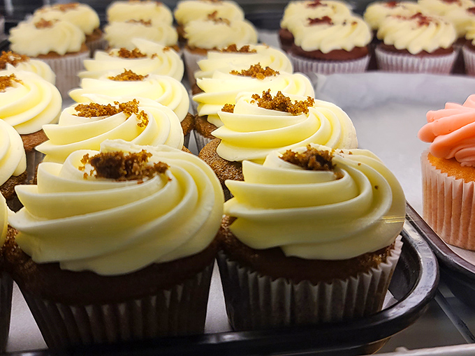 Cupcakes swirled to perfection—the kind that make you wonder if eating dessert first is actually the adult decision.