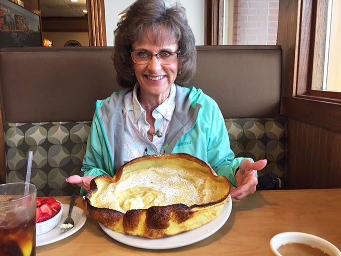 The German pancake arrives with such dramatic puffed edges, it deserves its own standing ovation and possibly an acceptance speech.