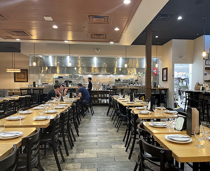 The dining room offers a front-row seat to culinary theater, where fellow diners' "mmm" sounds provide the soundtrack to your meal.