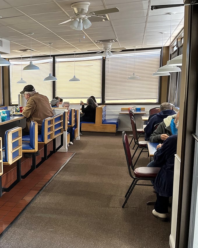 Real people enjoying real breakfast in real booths – this is what community and comfort food look like together.