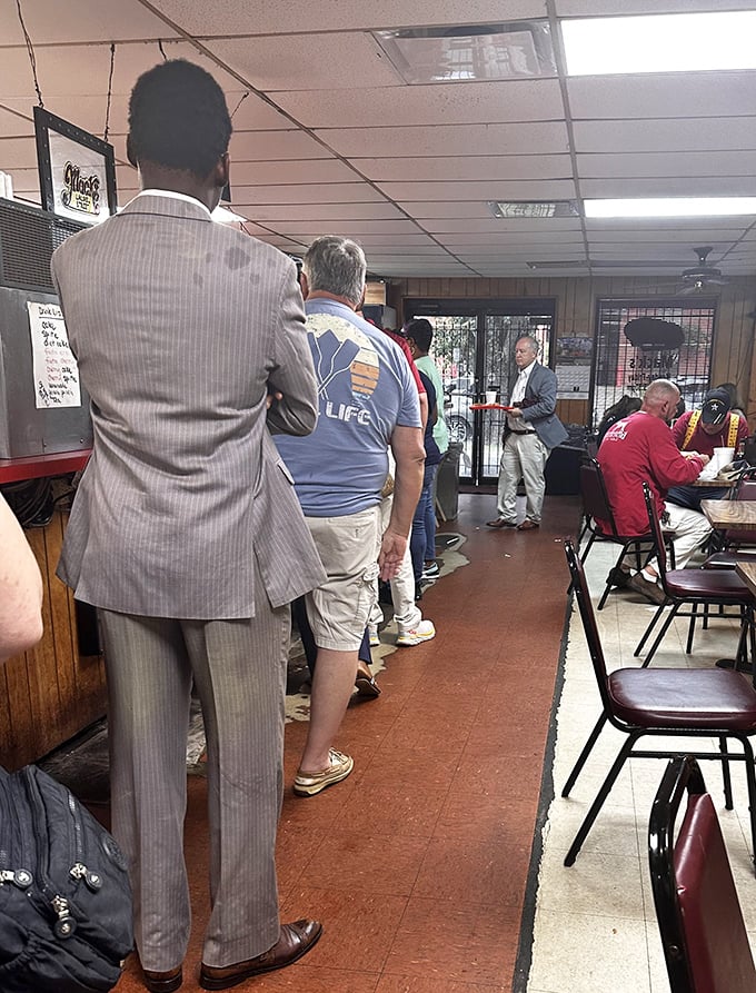 The lunchtime line at Mack's speaks volumes—when suits and t-shirts queue together, you know you've found food that transcends social boundaries.
