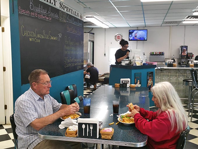 The counter is where the real action happens – where regulars become family and first-timers become regulars. The universal language of good food being spoken.