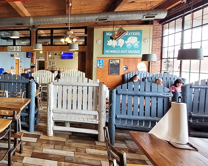 Blue Adirondack dividers create cozy dining nooks. Like eating in your neighbor's backyard, if your neighbor happened to be a BBQ genius.