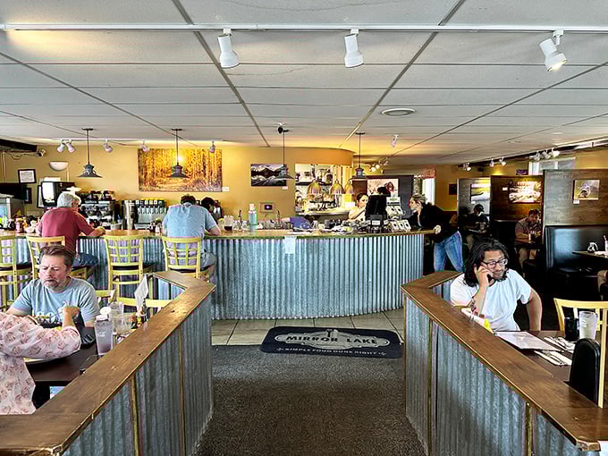 Where locals and travelers converge at the corrugated metal counter, trading tales of trails conquered and pancakes vanquished.