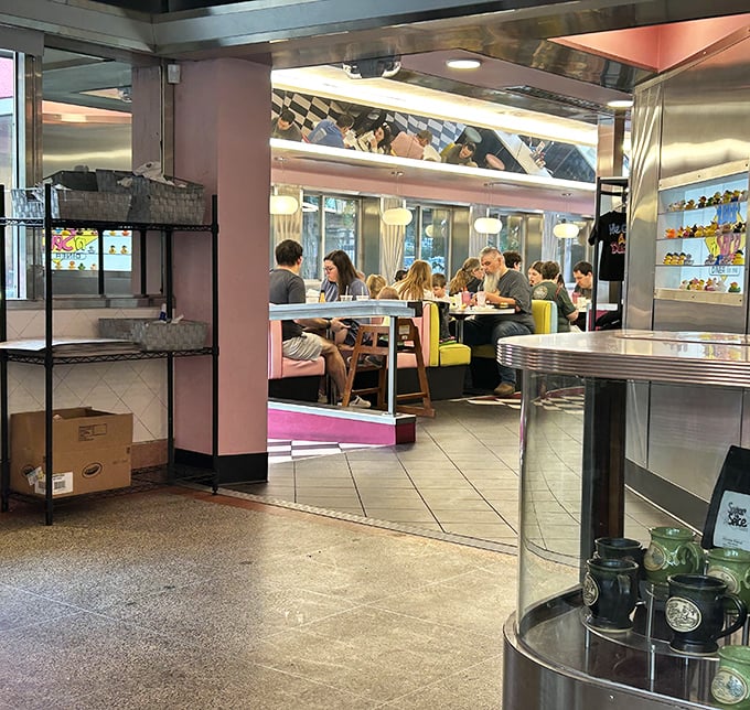 Where strangers become friends over the universal language of "pass the syrup." The diner's chrome and color create the perfect backdrop for morning conversations.
