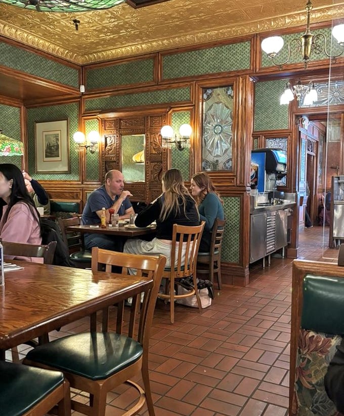 The dining room hums with the universal language of satisfied customers – forks meeting plates in a symphony of breakfast contentment.