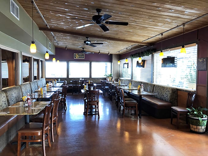 The dining room strikes that perfect balance between spacious and cozy, with wooden chairs and booths that invite you to settle in for the long haul.