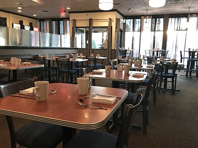 Empty tables that won't stay that way for long—the calm before the storm of eager diners seeking their morning fix.