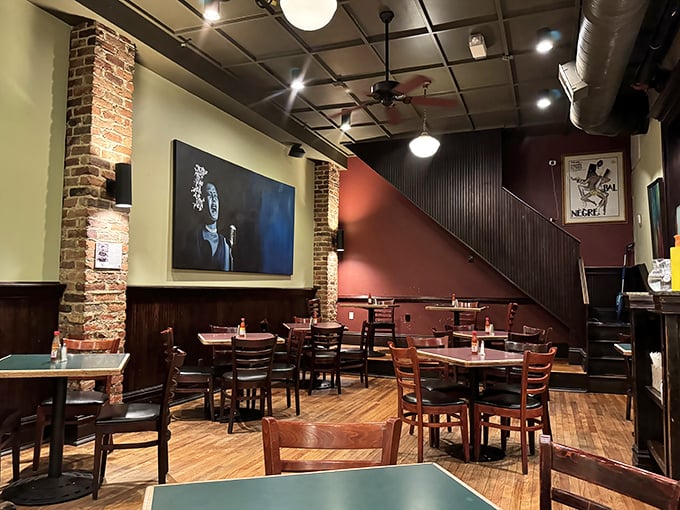 Exposed brick, wooden floors, and art that watches over diners like old friends—this space feels both timeless and perfectly Richmond.