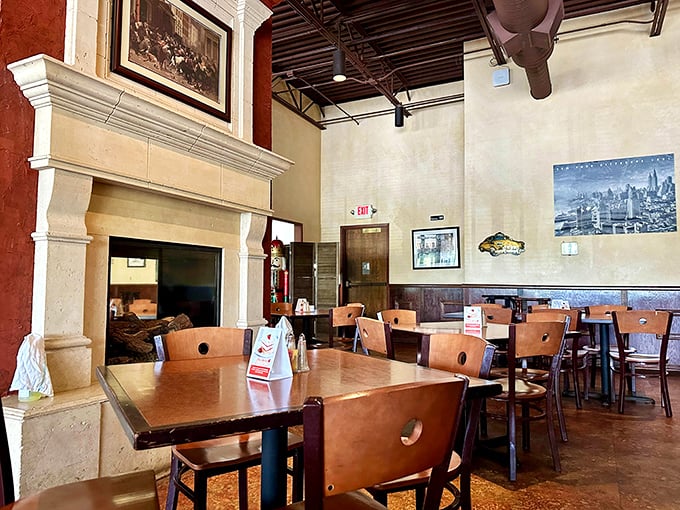 The dining area where memories are made, one schnitzel at a time – that fireplace isn't just for show, it's warming generations of happy diners.