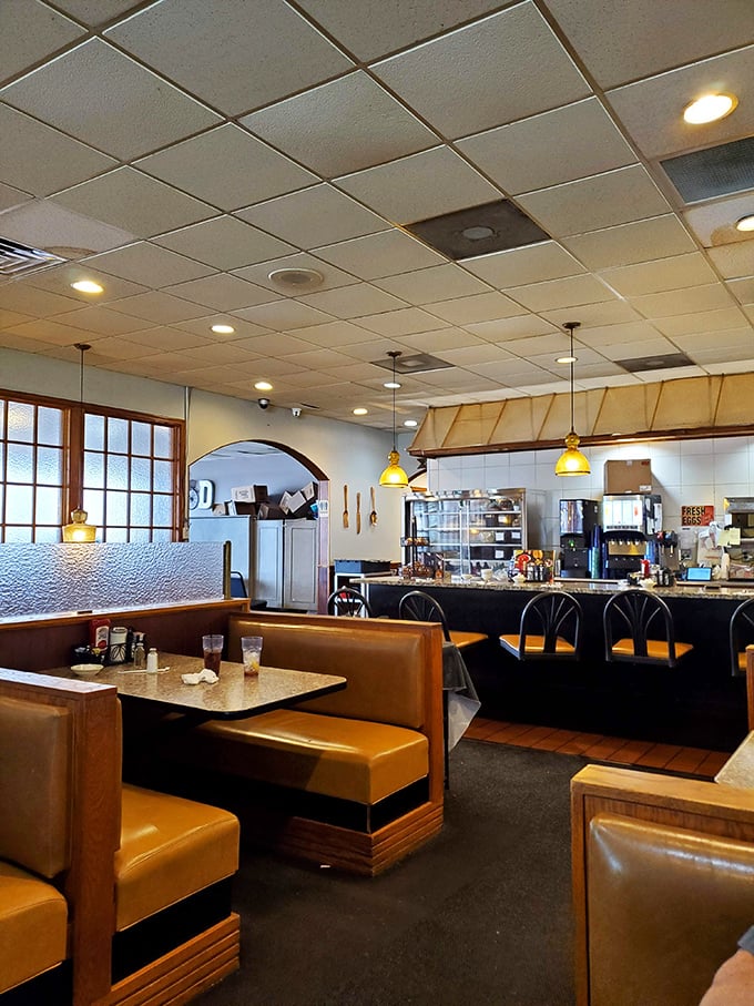 Sunshine streams through windows illuminating booths that have witnessed first dates, family reunions, and countless "just one more bite" moments.