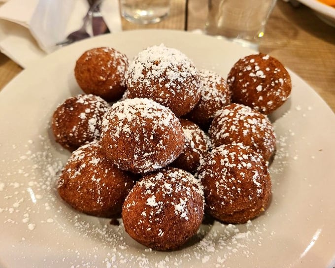These donut holes aren't just a treat—they're Lou Mitchell's way of saying "welcome to the family" before you've even ordered.