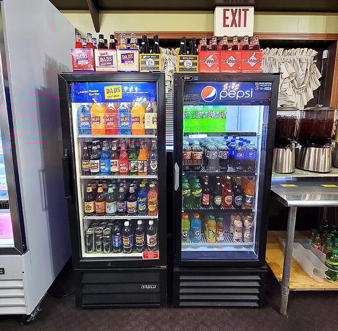 The drink coolers stand ready like soldiers guarding liquid refreshment – a rainbow of options to wash down your Amish feast.