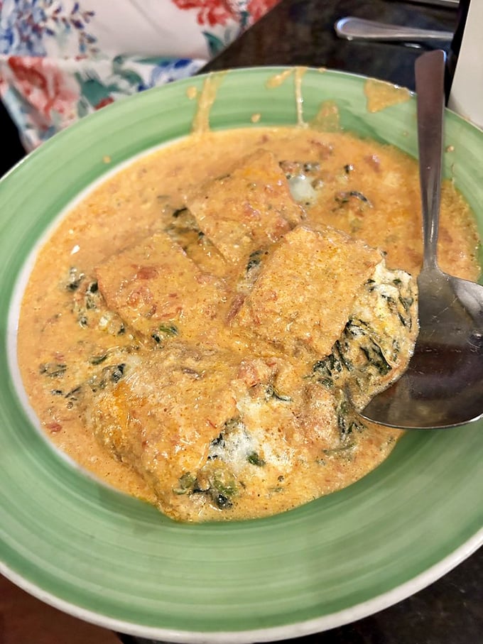 This isn't just eggplant rollatini; it's a warm embrace in food form, swimming in a rose-colored sauce you'll dream about later.