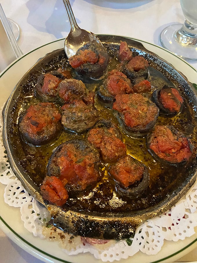 Escargot: where garlic butter transforms garden creatures into gourmet treasures. Conquer any hesitation—your taste buds will thank you.