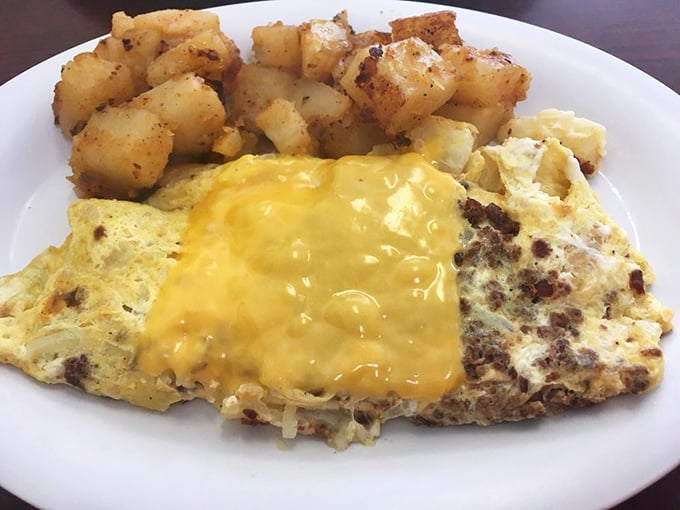 The farmer's omelet and home fries—a plate that says "You won't be hungry again until dinner" in the most delicious way possible.