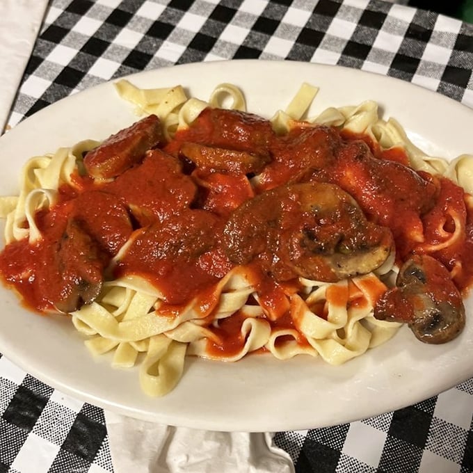 Fettuccine with mushrooms and red sauce – proof that sometimes the simplest combinations create the most profound satisfaction.