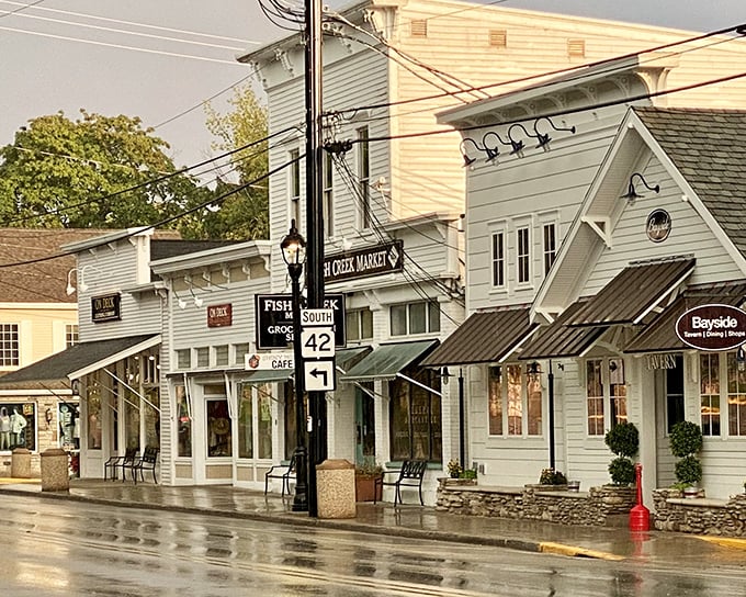 Rain-slicked streets can't dampen the warm glow of Fish Creek Market, where locals have been gathering essentials and exchanging news for generations.