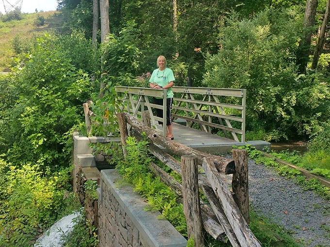 This footbridge isn't just connecting two pieces of land—it's connecting visitors to the timeless pleasure of simply being outdoors.