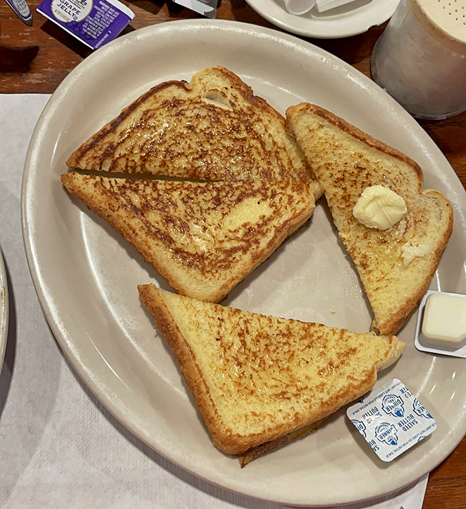 Toast transformed from humble bread to golden-brown perfection—the kind that makes you wonder why anyone bothers with fancy pastries.