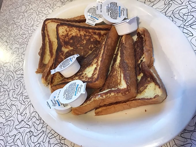 French toast that's been dipped, griddled, and transformed into something that makes ordinary bread weep with jealousy.
