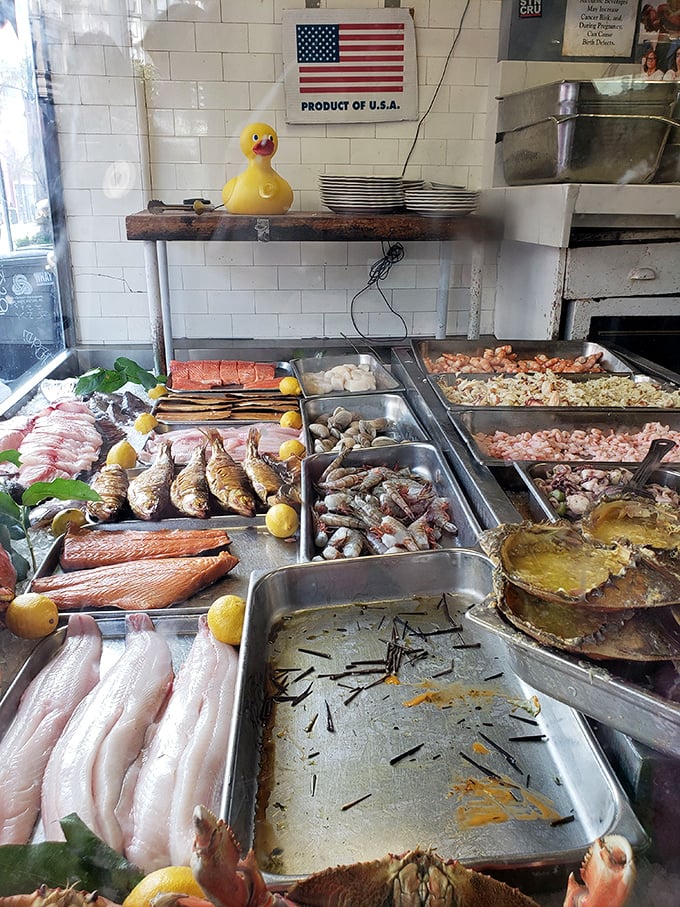 The seafood display – a glistening treasure chest of ocean delights where the rubber ducky stands guard. Fresh doesn't begin to describe it.
