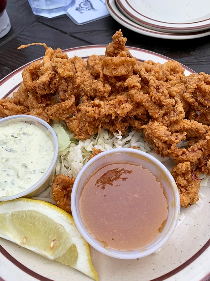 Crispy fried clams with two dipping sauces—because important decisions shouldn't be made on an empty stomach.