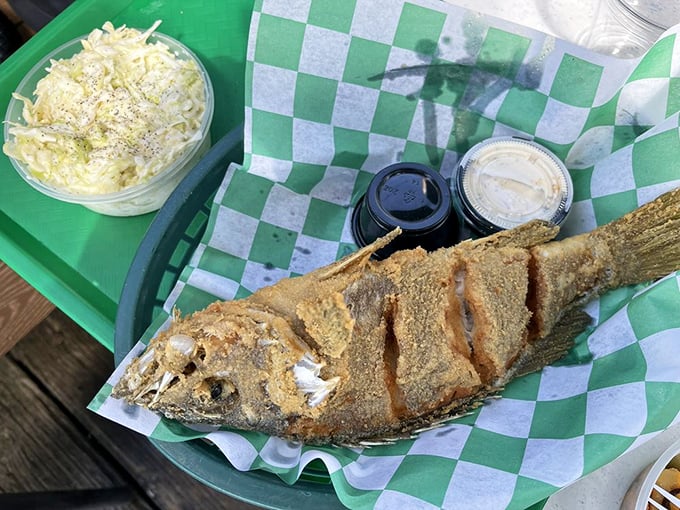 This whole fried fish isn't playing games – it's the seafood equivalent of showing up to a party in your finest outfit, ready to impress.