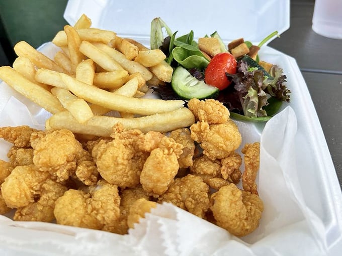 Crispy fried shrimp that snap between your teeth, served with fries so perfect they deserve their own fan club.
