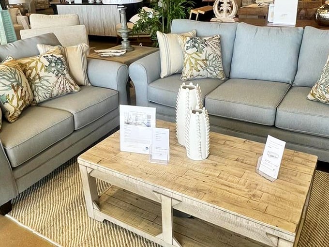 Coastal-inspired living room furniture that whispers "you could be this put-together at home" while the price tags quietly add, "and still afford your beach vacation next year."