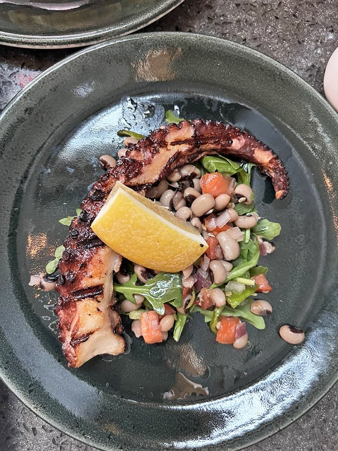 Octopus that would make Poseidon jealous, perfectly charred and paired with beans that have clearly found their soulmate.