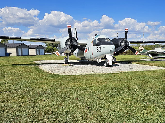 The Grumman C-1 Trader sits proudly on its circular pad, a chunky propeller-driven reminder that not everything in aviation needed to look like a speeding bullet.