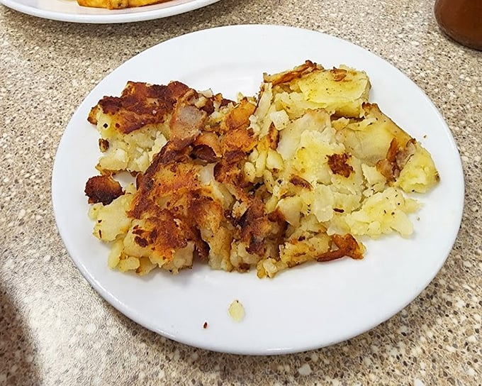 Home fries that achieve the impossible – crispy edges with pillowy centers. These golden nuggets are the real treasure of Nevada.