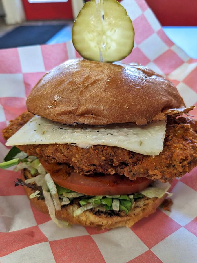 This sandwich isn't just stacked—it's architected. The pickle crown is like the cherry on top of a savory masterpiece.